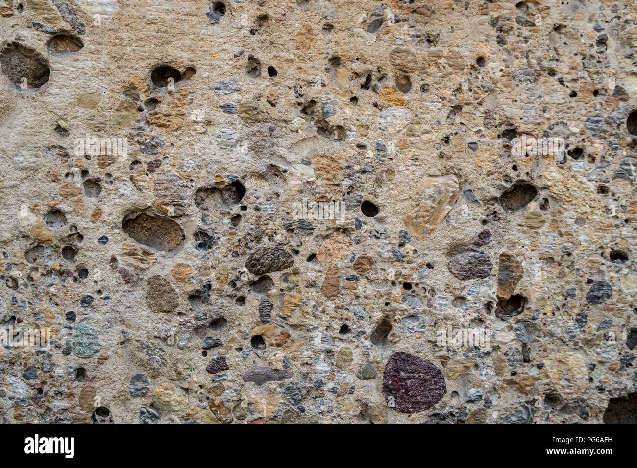 Stone wall background Wall made of cavern rock Stock Photo - Alamy