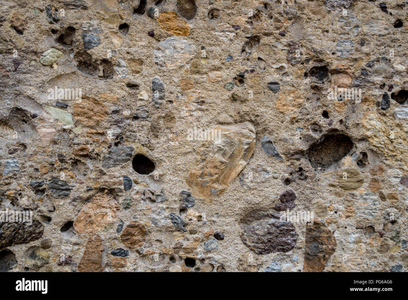 Stone wall background Wall made of cavern rock Stock Photo - Alamy