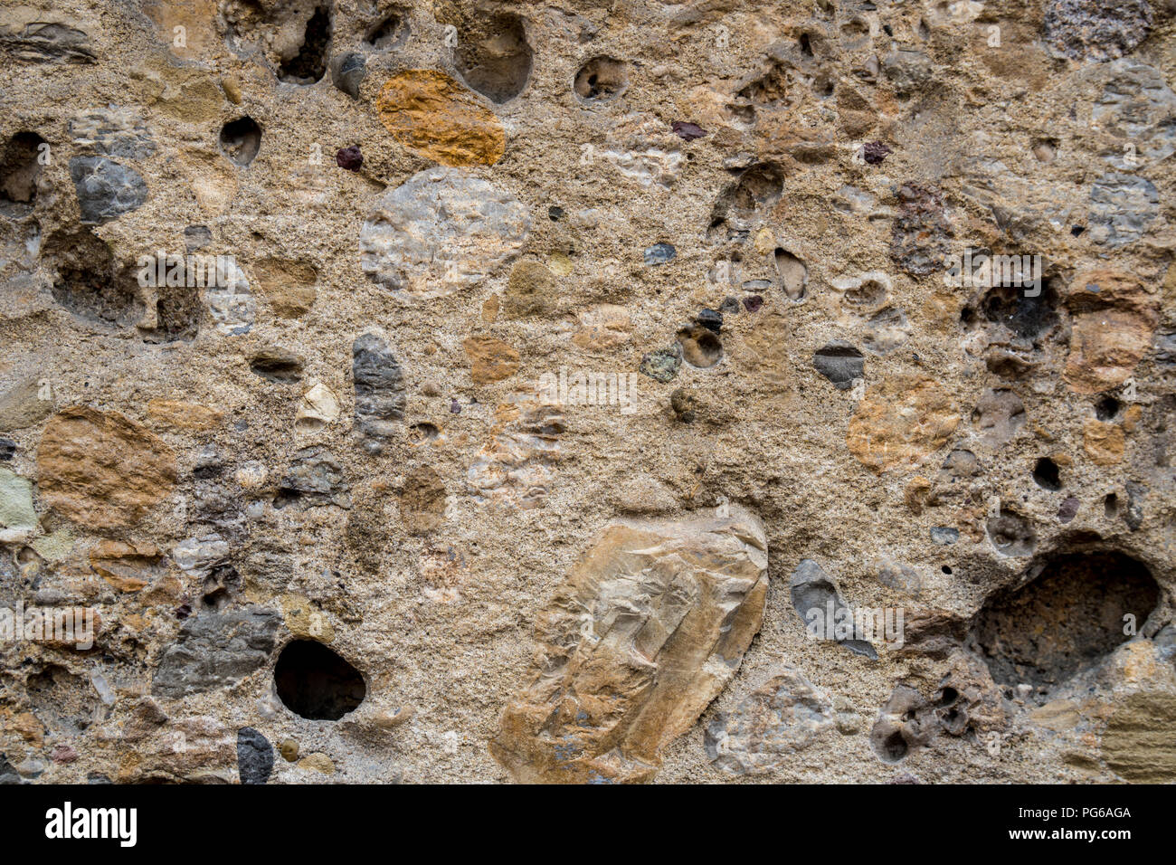Stone wall background Wall made of cavern rock Stock Photo - Alamy