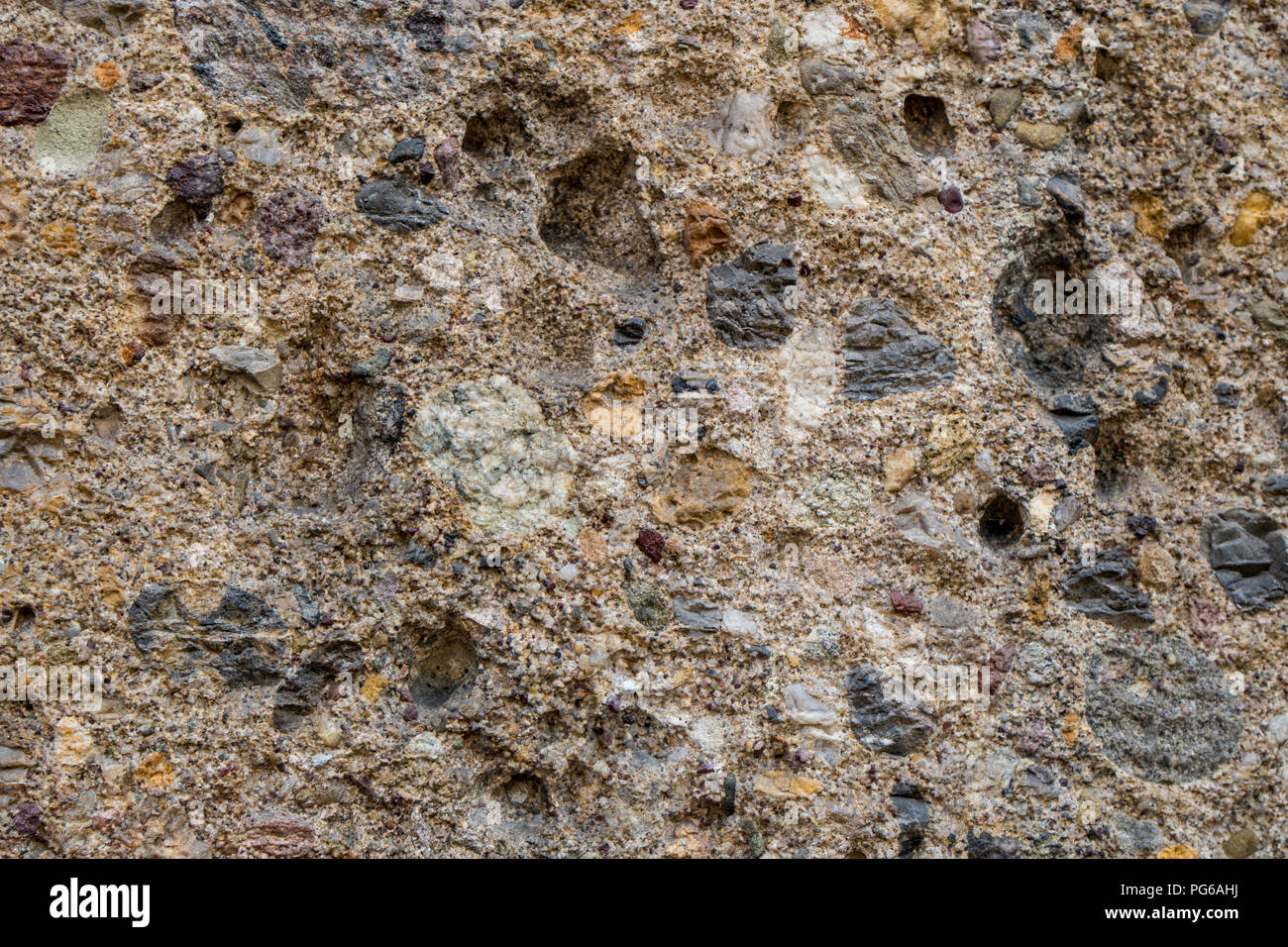 Stone wall background Wall made of cavern rock Stock Photo - Alamy