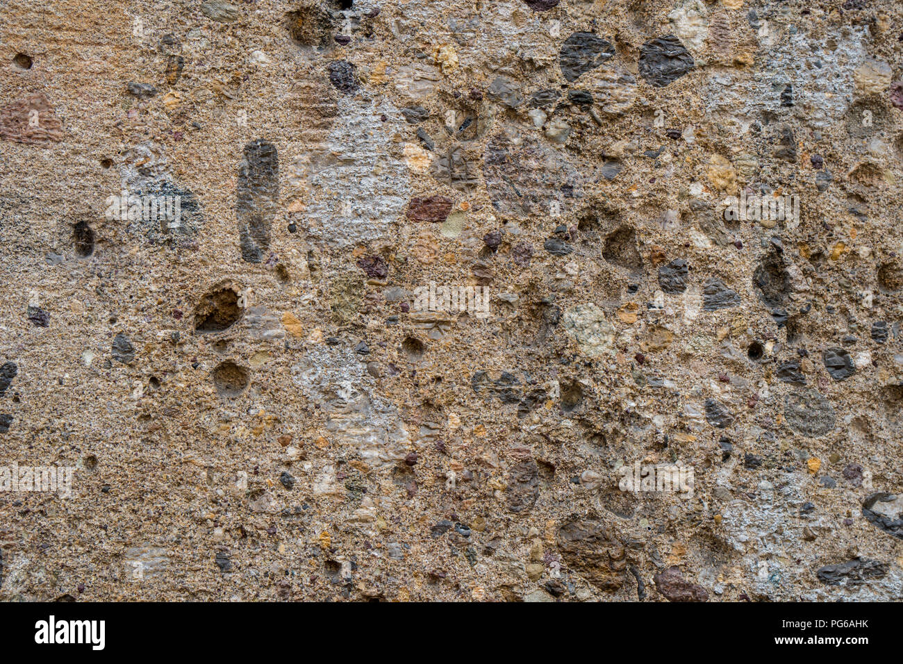 Stone wall background Wall made of cavern rock Stock Photo - Alamy