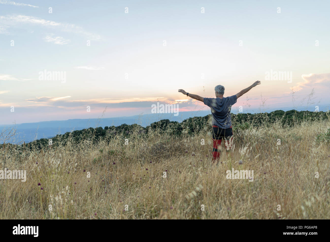 Man standing montserrat sunset hi-res stock photography and images - Alamy