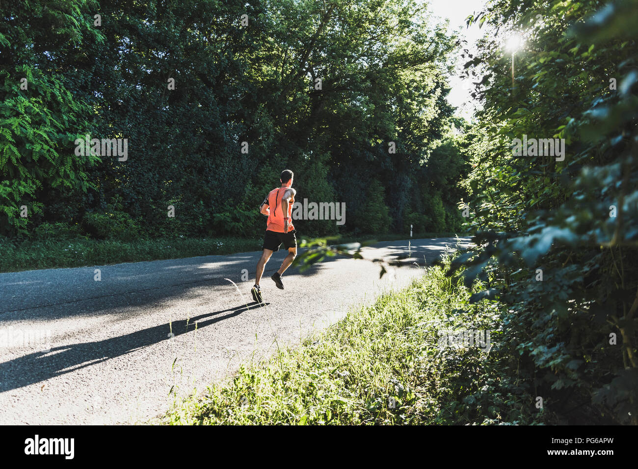 Man running rear view hi-res stock photography and images - Alamy