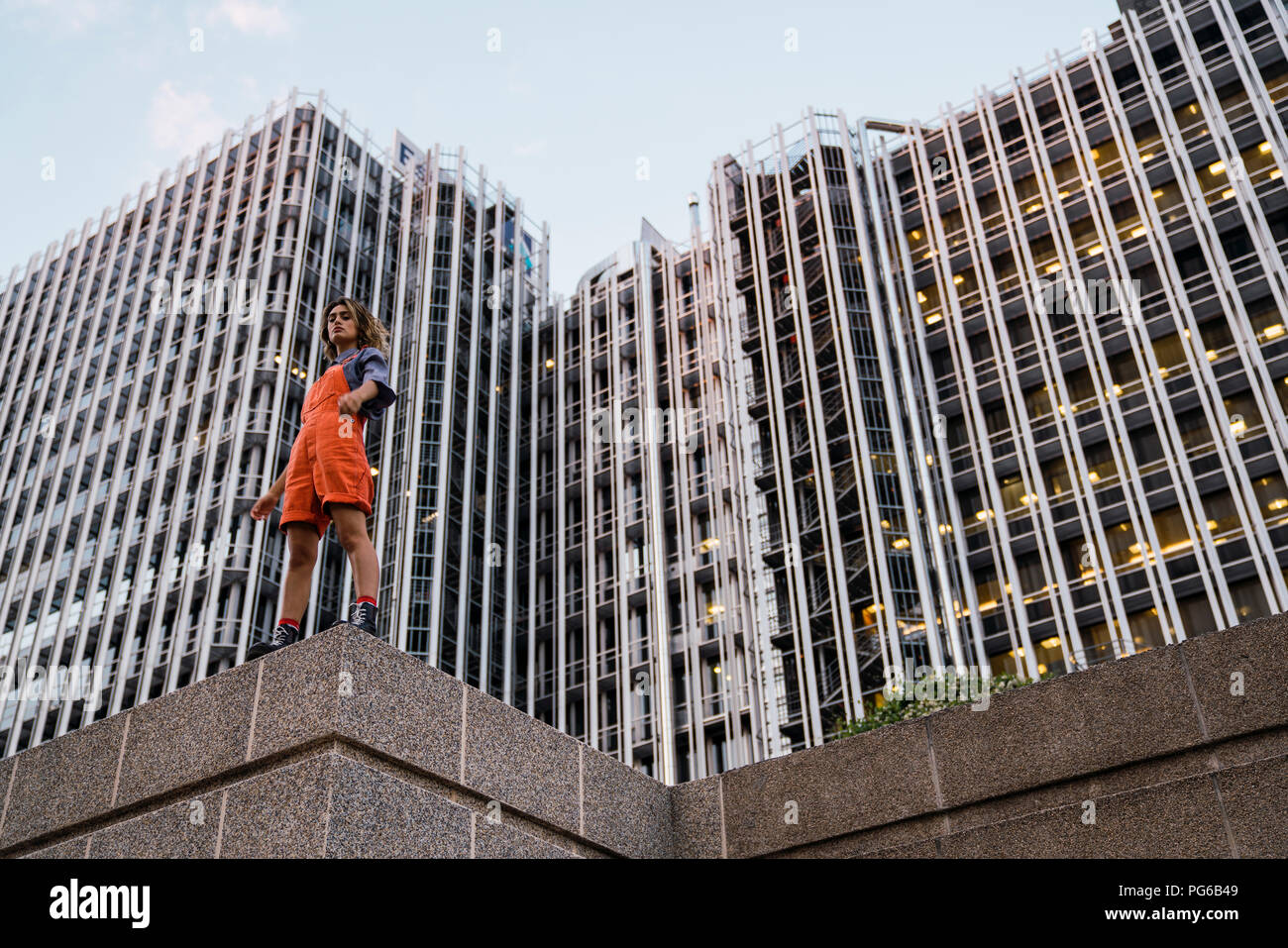 Standing ledge front modern high rise building hi-res stock photography ...