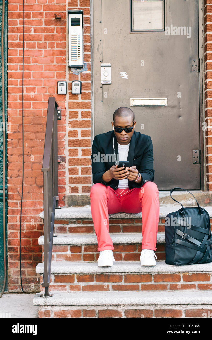 Man waiting on stairs hi-res stock photography and images - Alamy