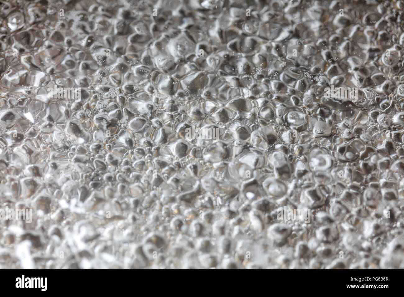 boiling water with bubbles for background Stock Photo - Alamy