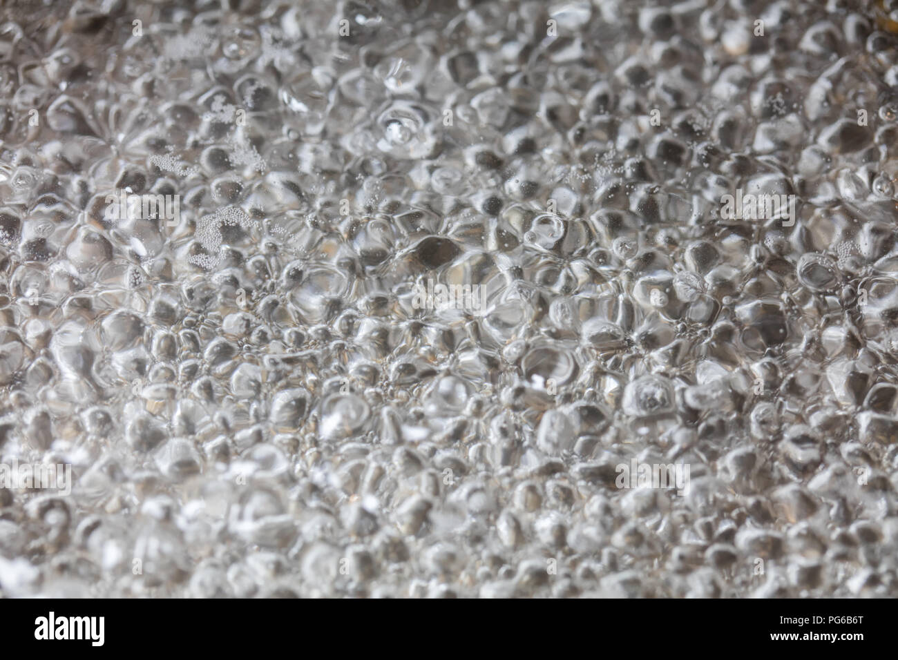 boiling water with bubbles for background Stock Photo - Alamy