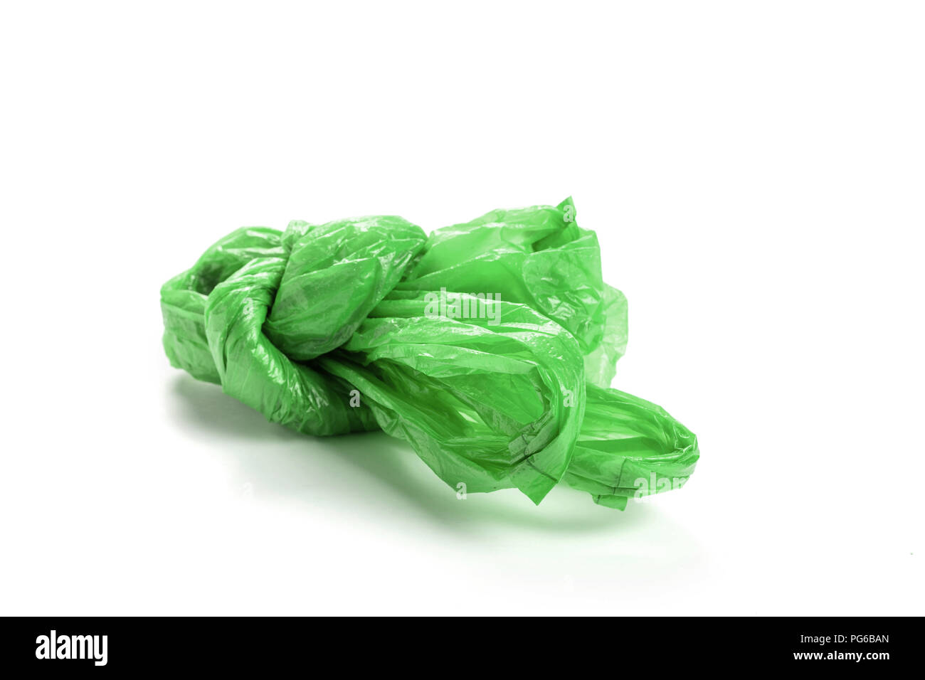 Green Plastic Bag close up with white background Stock Photo - Alamy