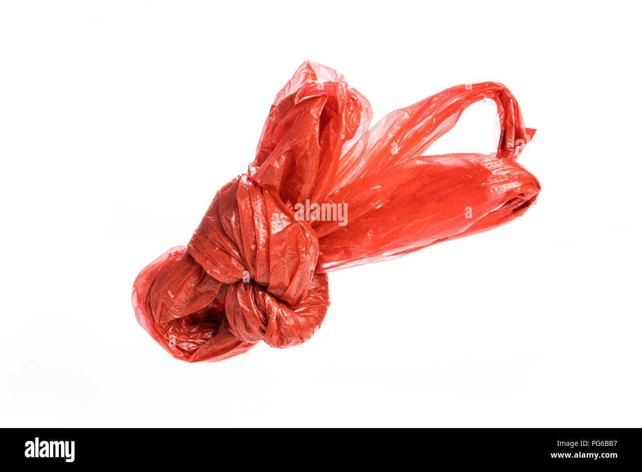 Red Plastic Bag close up with white background Stock Photo - Alamy