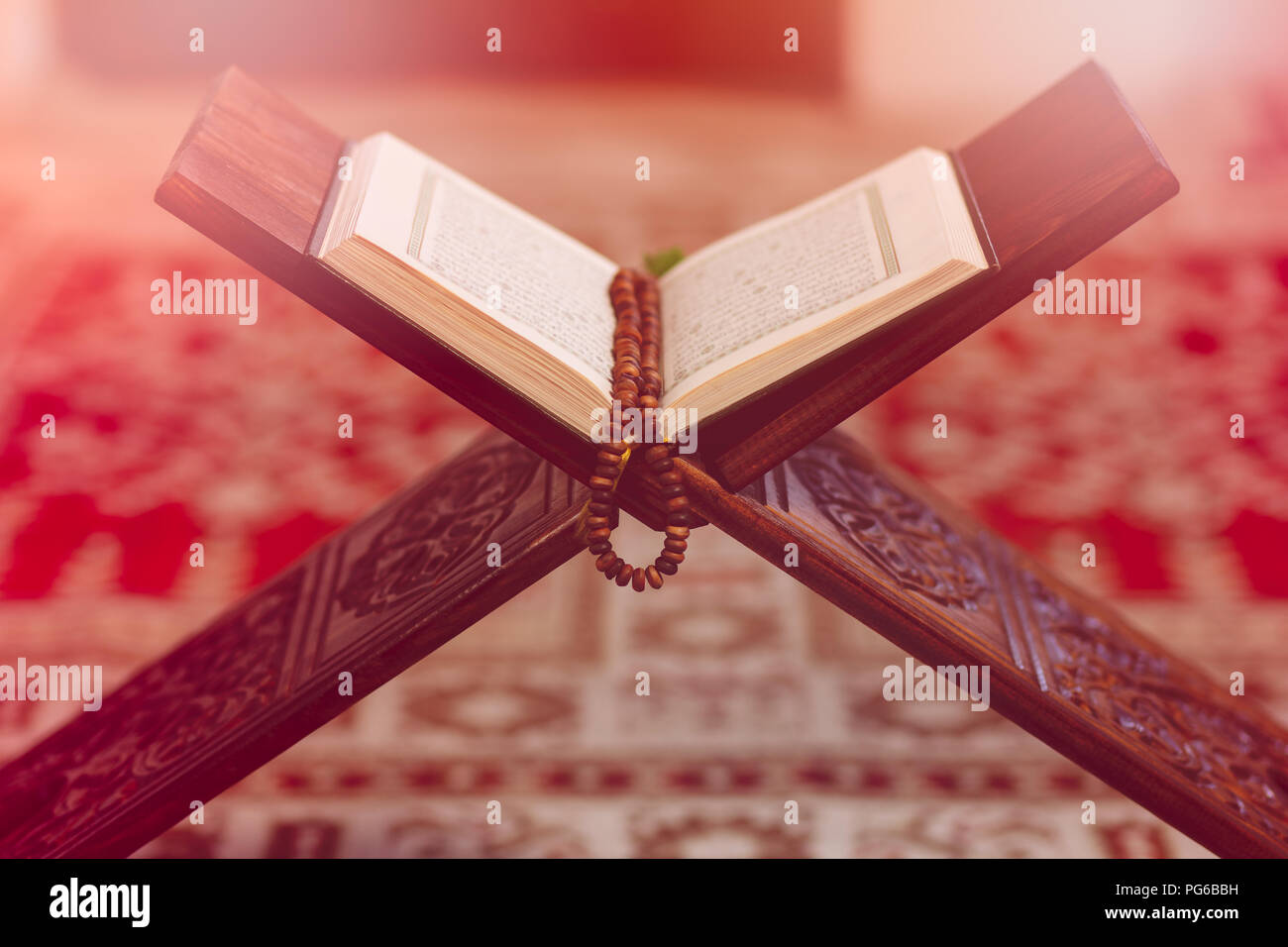 Quran in the mosque - open for prayers Stock Photo - Alamy