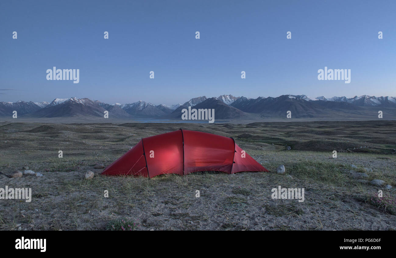 Camping above Lake Zorkul, with the Great Pamir Range in Afghanistan ...