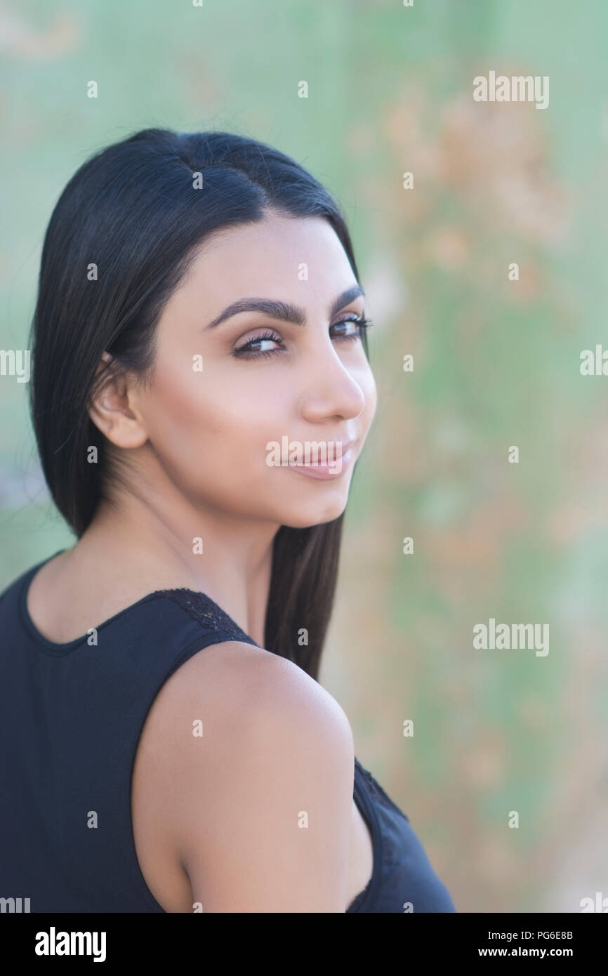 Smiling beautiful young arab hi-res stock photography and images - Alamy