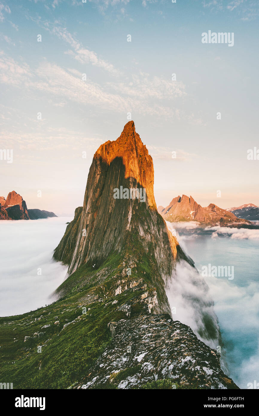 Segla Mountain sunset peak Landscape over clouds and fjord view in ...