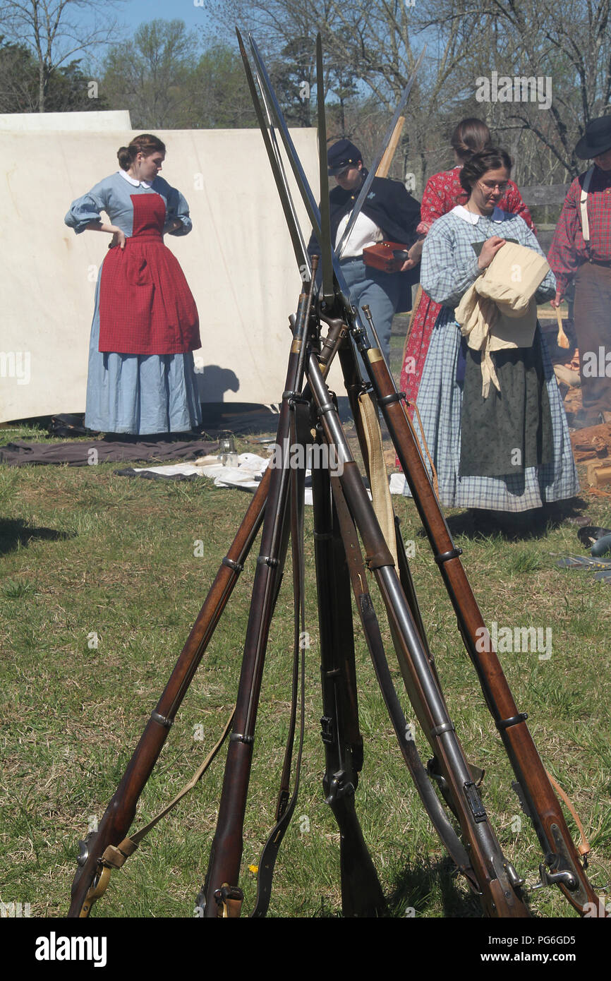 Muskets with bayonets stacked together in Union camp. Historical ...