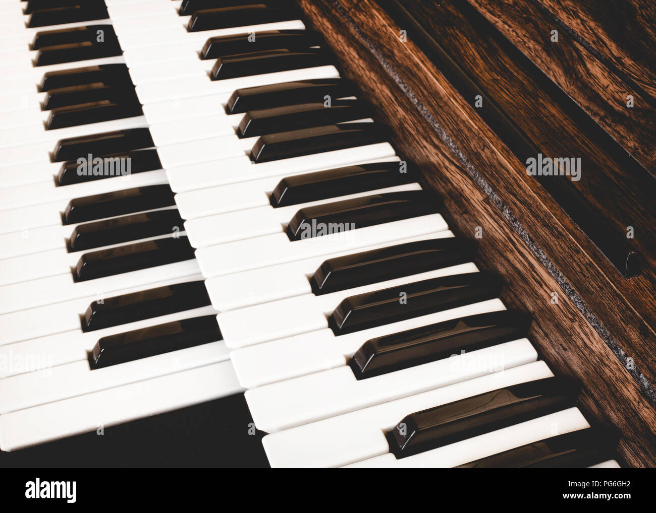 Closeup view of double piano keys Stock Photo - Alamy