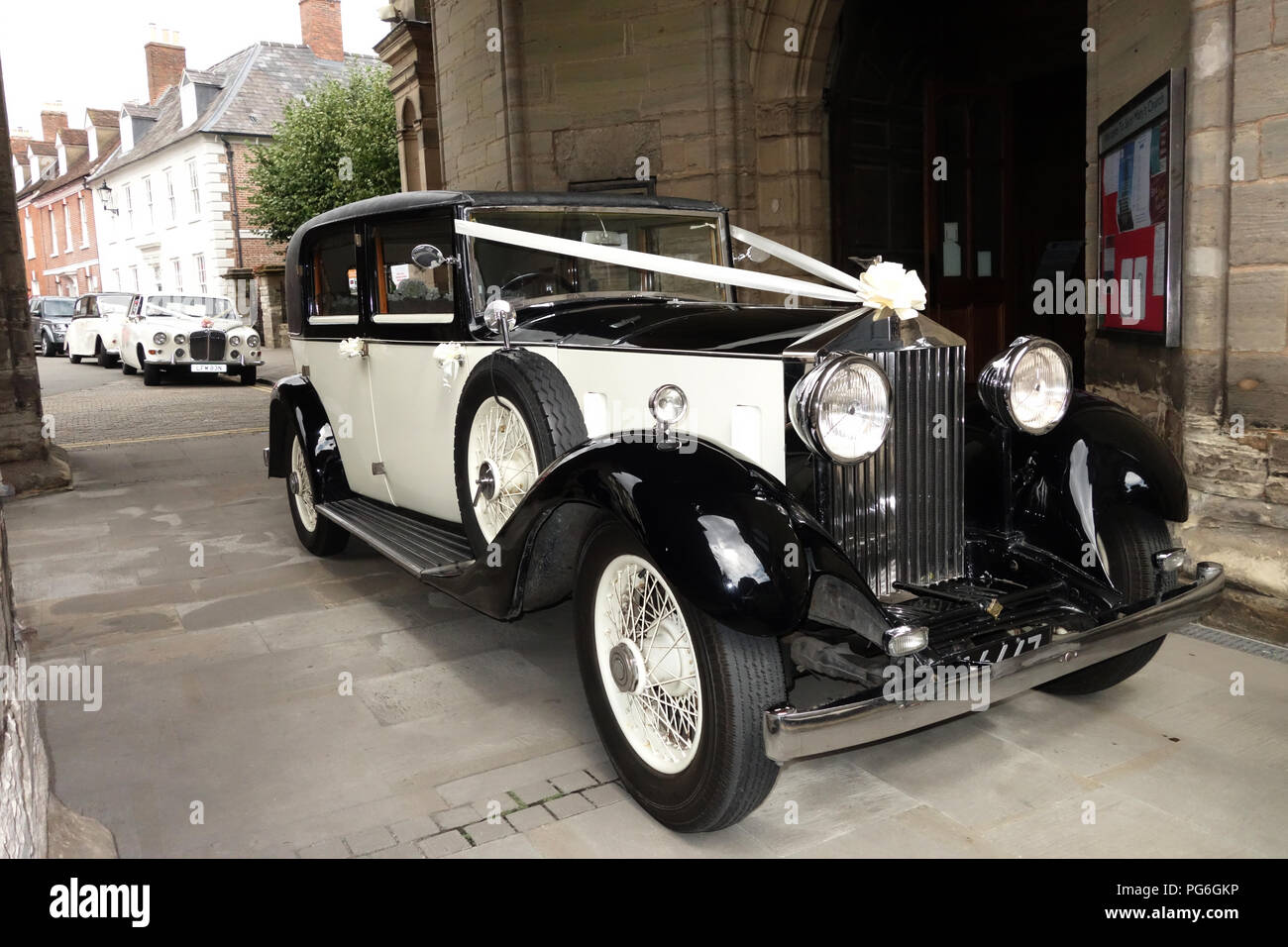 Vintage Rolls Royce wedding car outside a church in Warwick Stock Photo ...