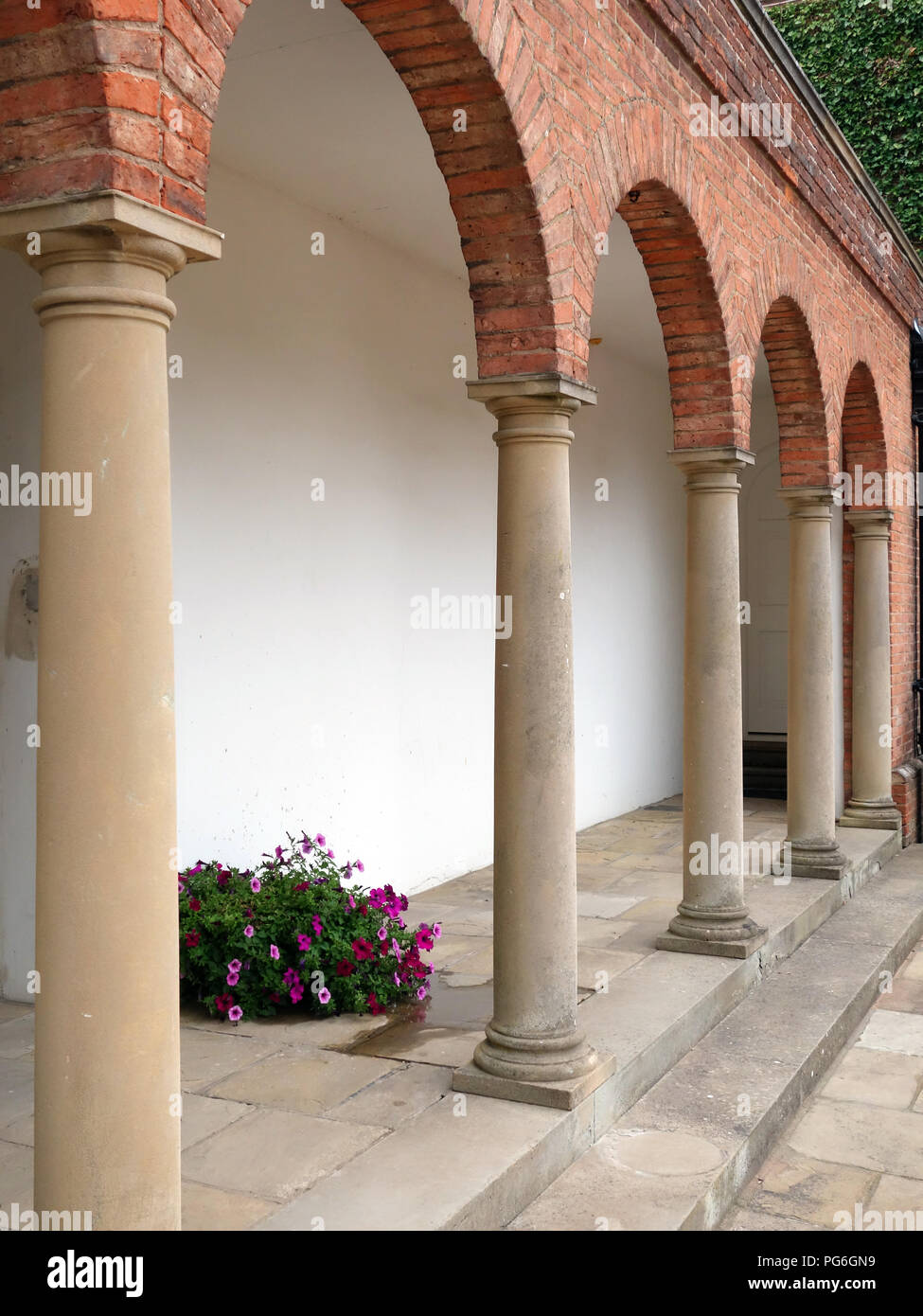 Stone pillar and brick archway at large country house in Yorkshire ...