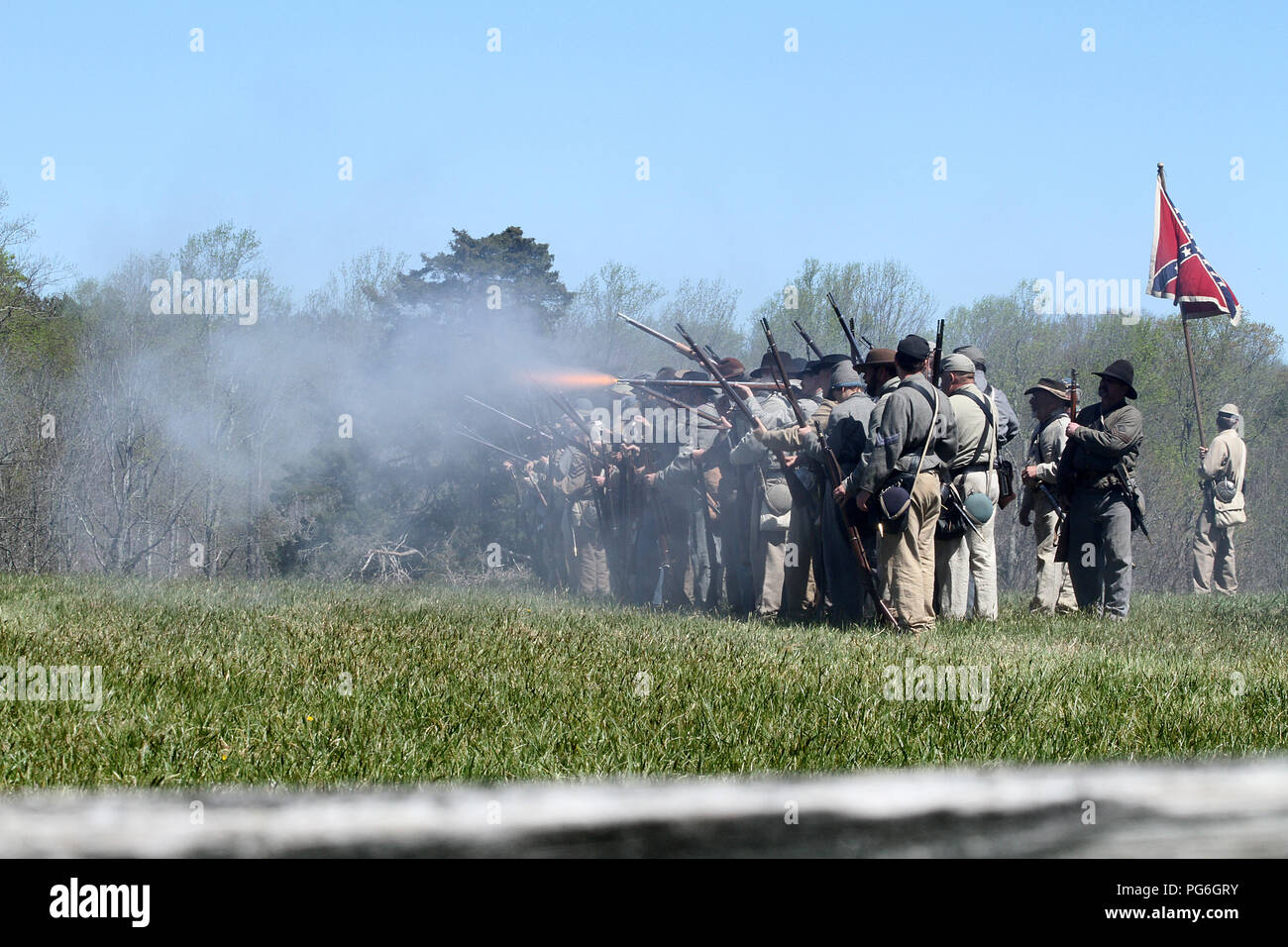 The Confederate States Army firing the muskets. Historical reenactment ...