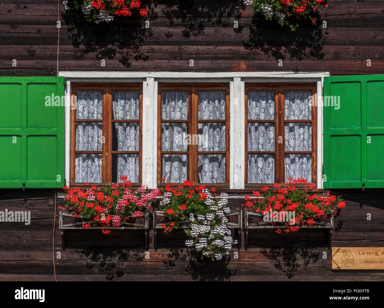 Typical alpine windows in Staffa (Macugnaga Stock Photo - Alamy