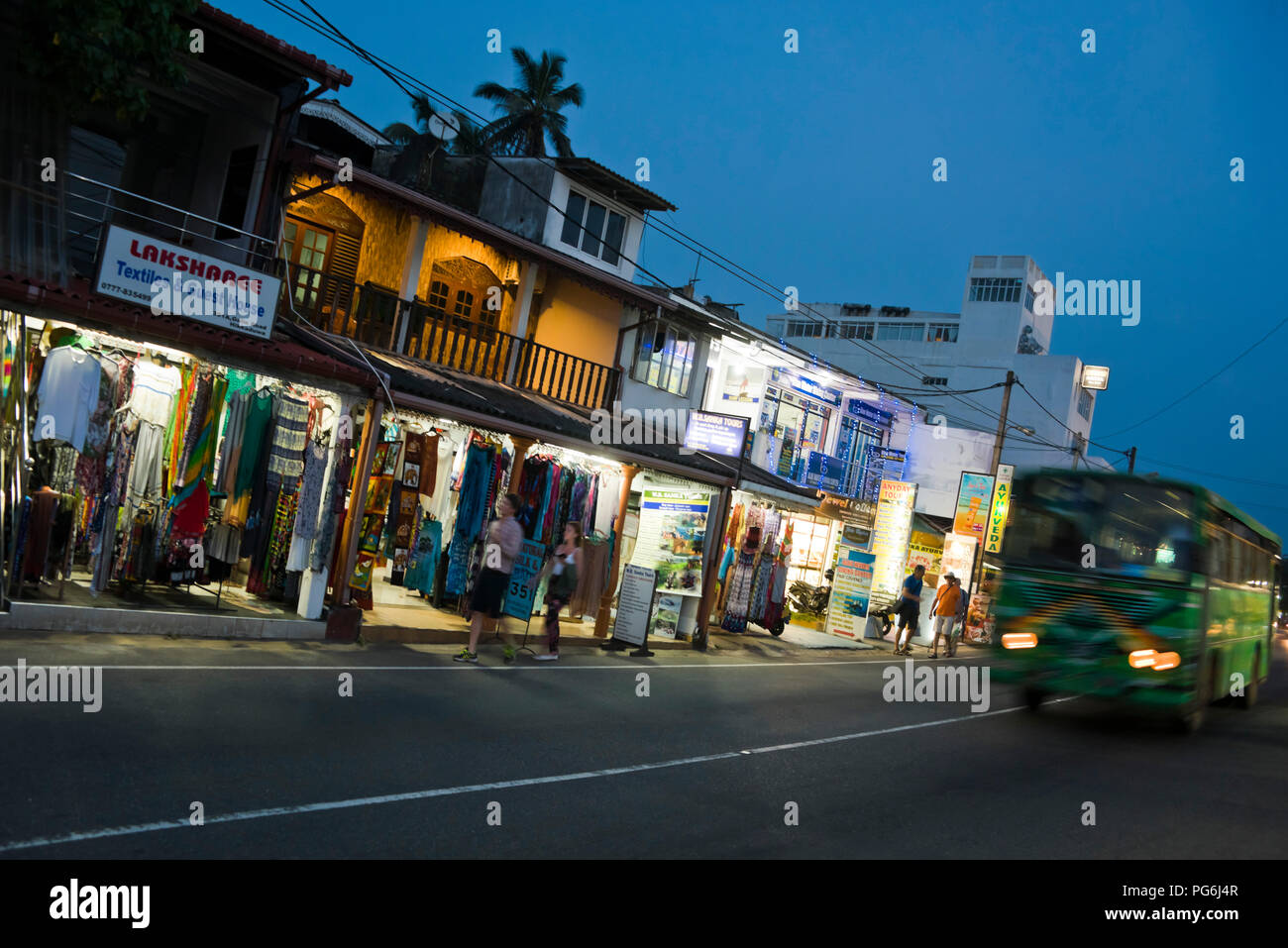 Horizontal nighttime streetscape in Hikkaduwa, Sri Lanka Stock Photo ...