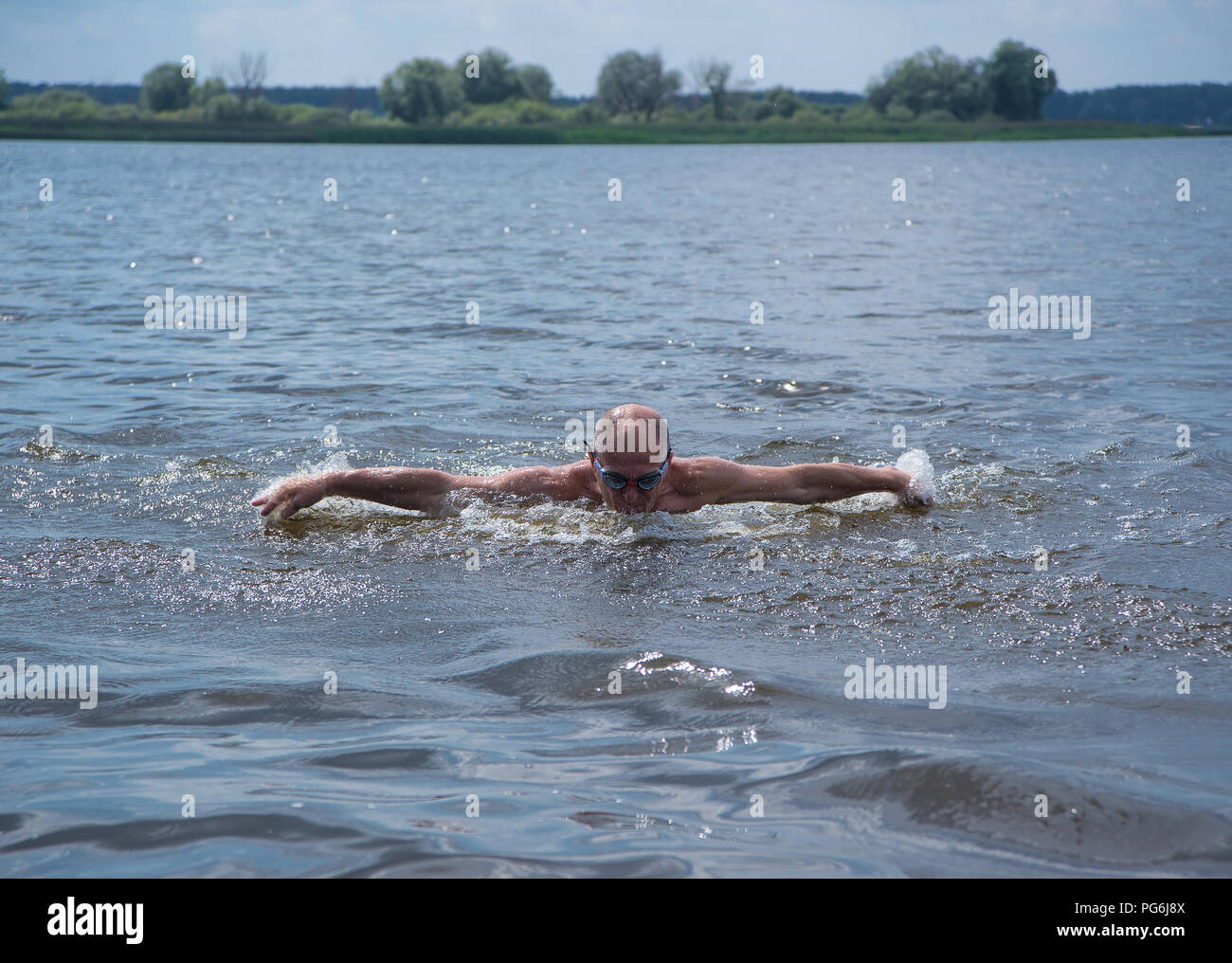 Old man swims hi-res stock photography and images - Alamy