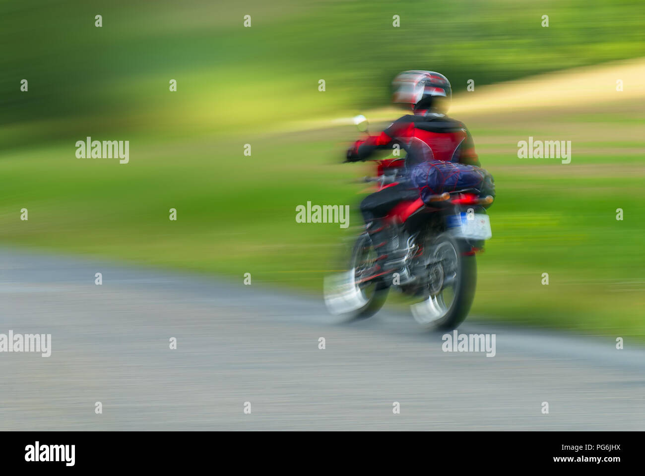 The motorcyclist photographed during high-speed movement Stock Photo ...