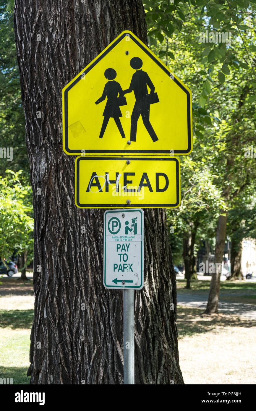Yellow children crossing road sign, Portland, Oregon, USA Stock Photo ...