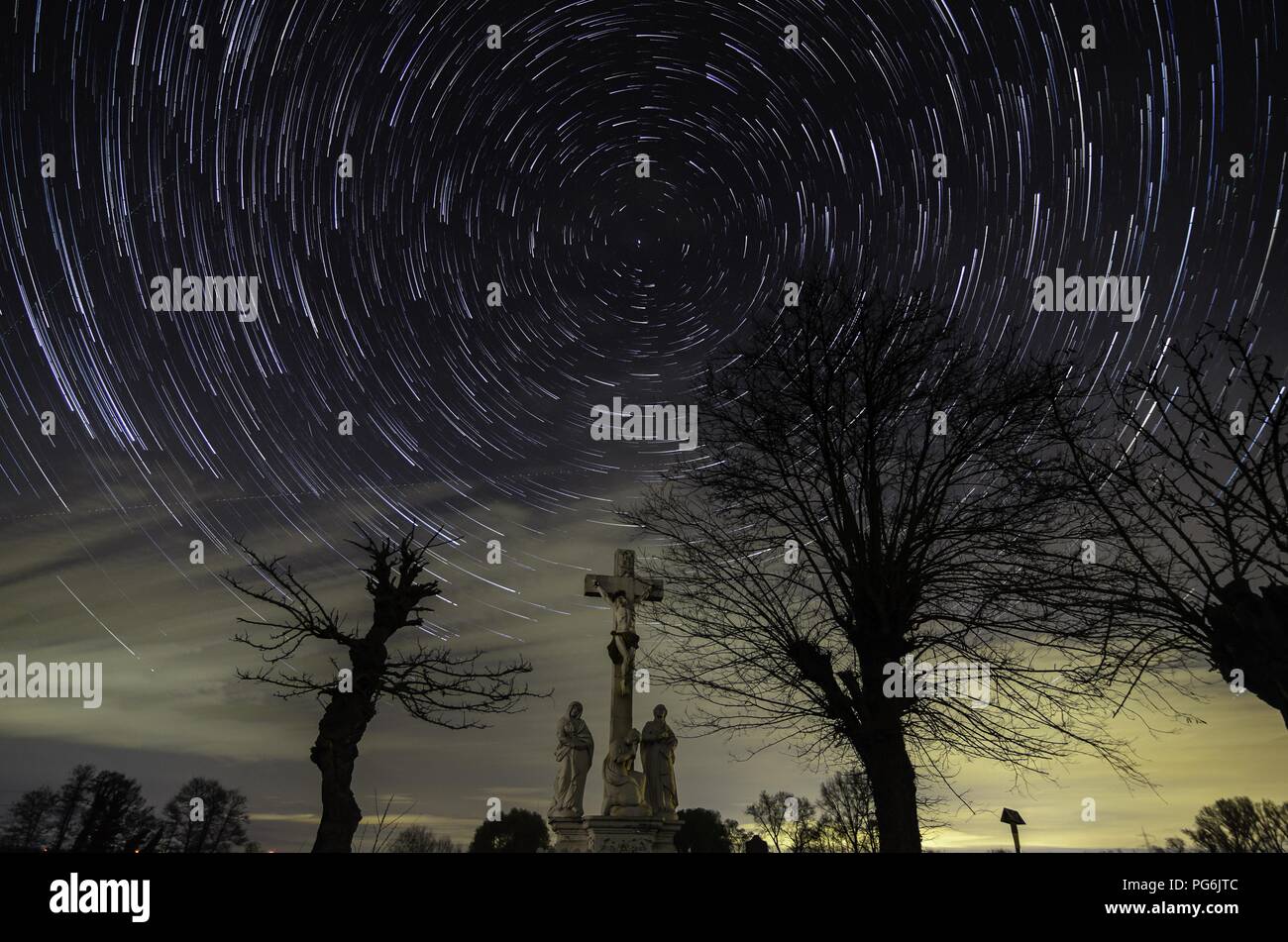 christian cross at night with stars clouds trees Stock Photo - Alamy