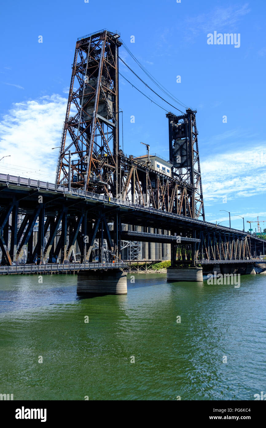 The Steel Bridge over the Willamette River with lower deck raised to ...