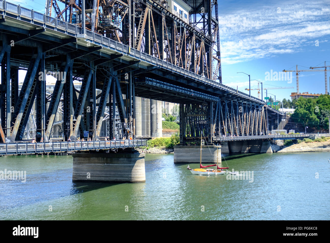 The Steel Bridge over the Willamette River with lower deck raised to ...