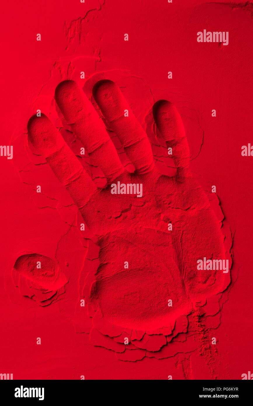 top view of human hand shape on red powder Stock Photo - Alamy
