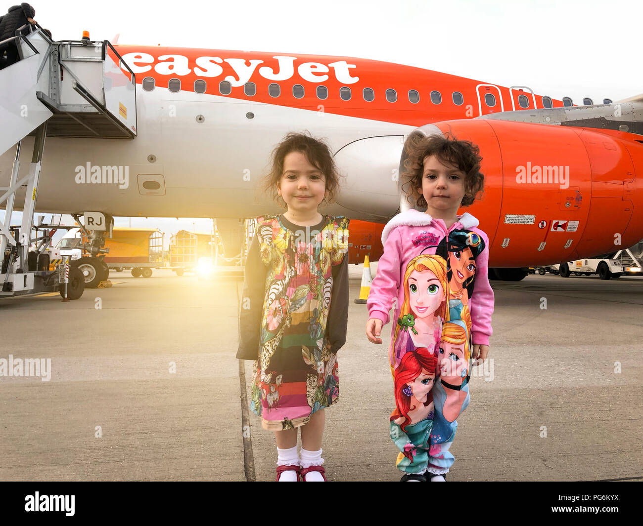 Young girls on an Easy Jet flight Stock Photo - Alamy