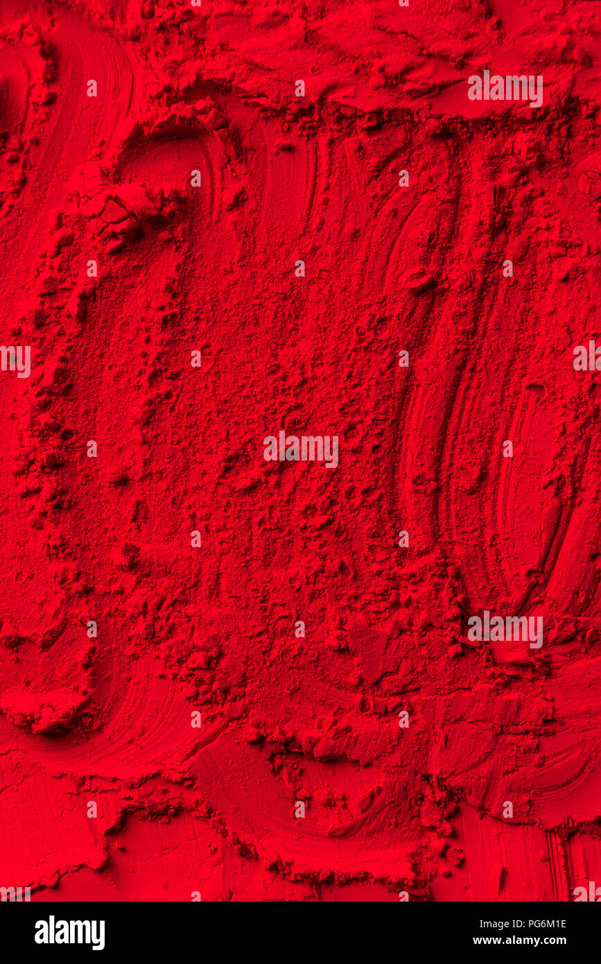 elevated view of red powder background Stock Photo - Alamy