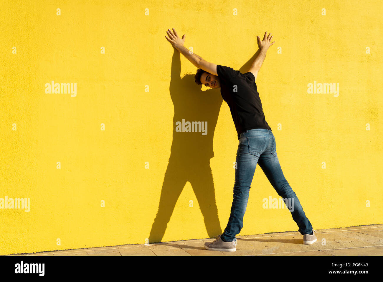 Being supported to stand by an adult hi-res stock photography and ...