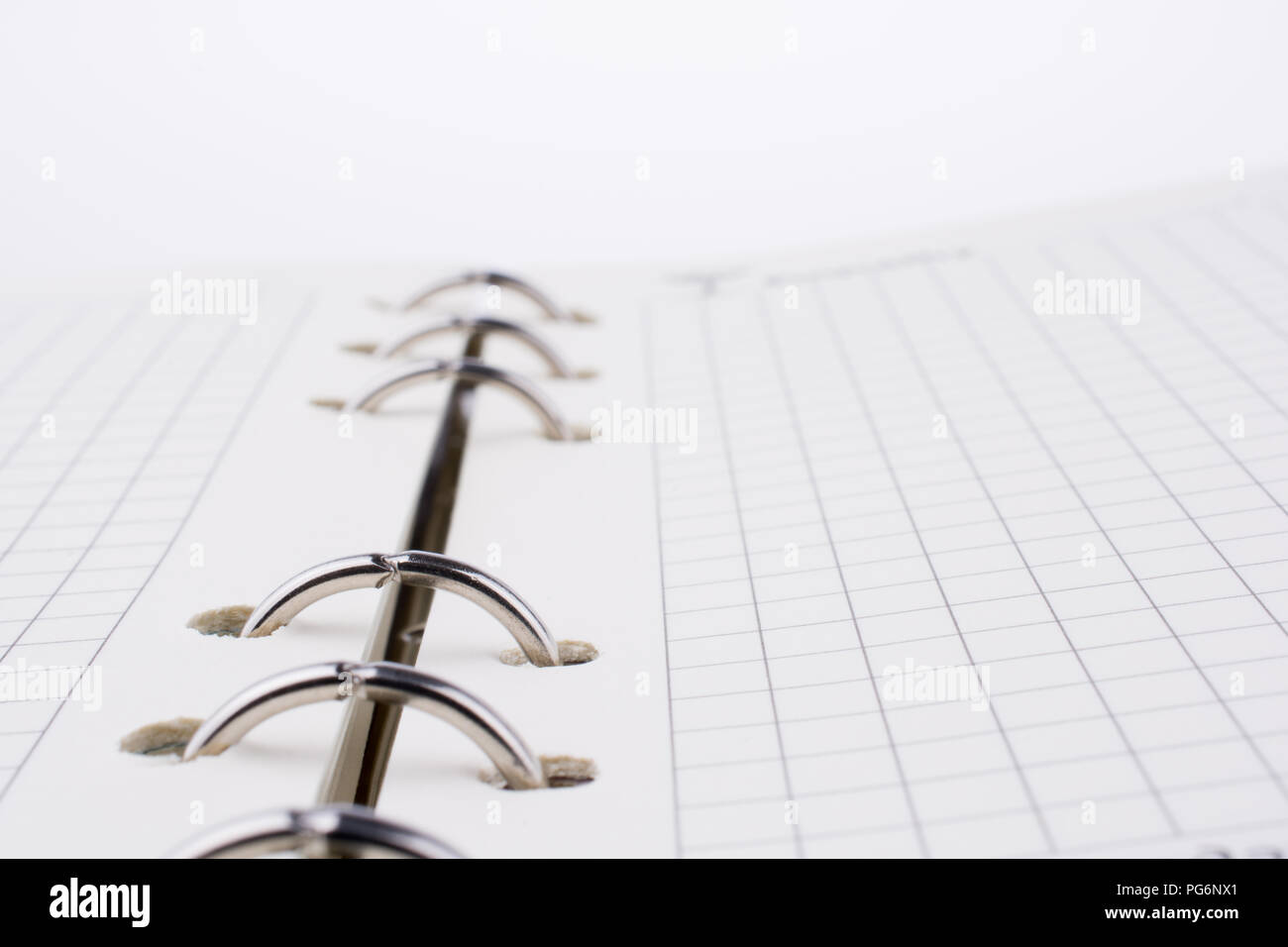 Checked white notebook Stock Photo - Alamy