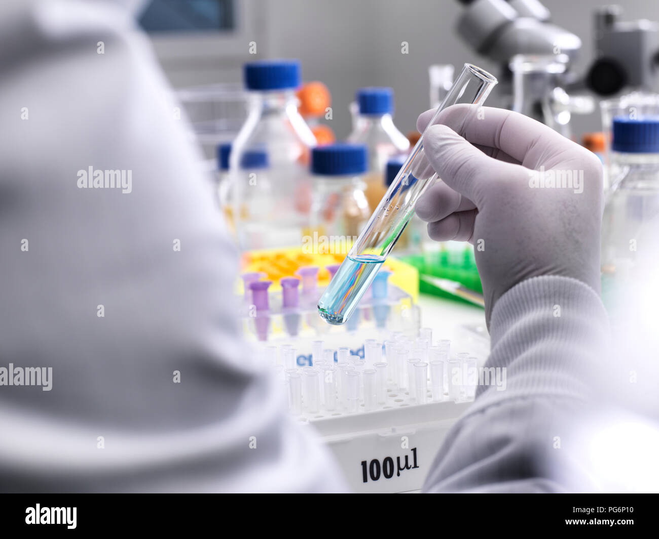research-experiment-scientist-mixing-a-chemical-formula-in-a-test-tube-stock-photo-alamy