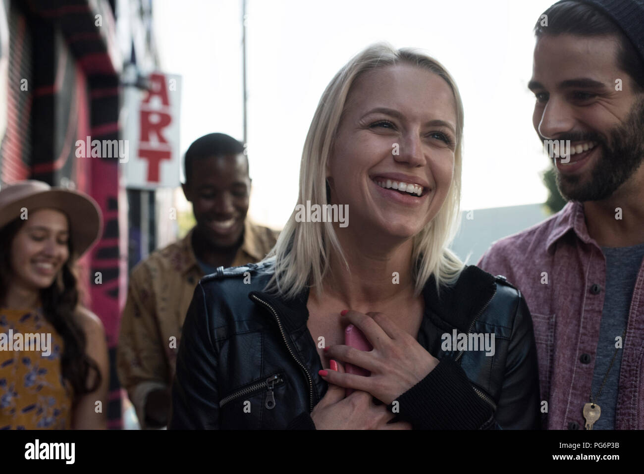 Young couple socializing together hi-res stock photography and images ...