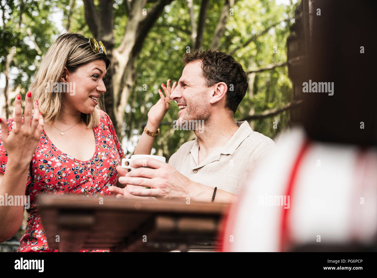 Talking outdoor hi-res stock photography and images - Alamy