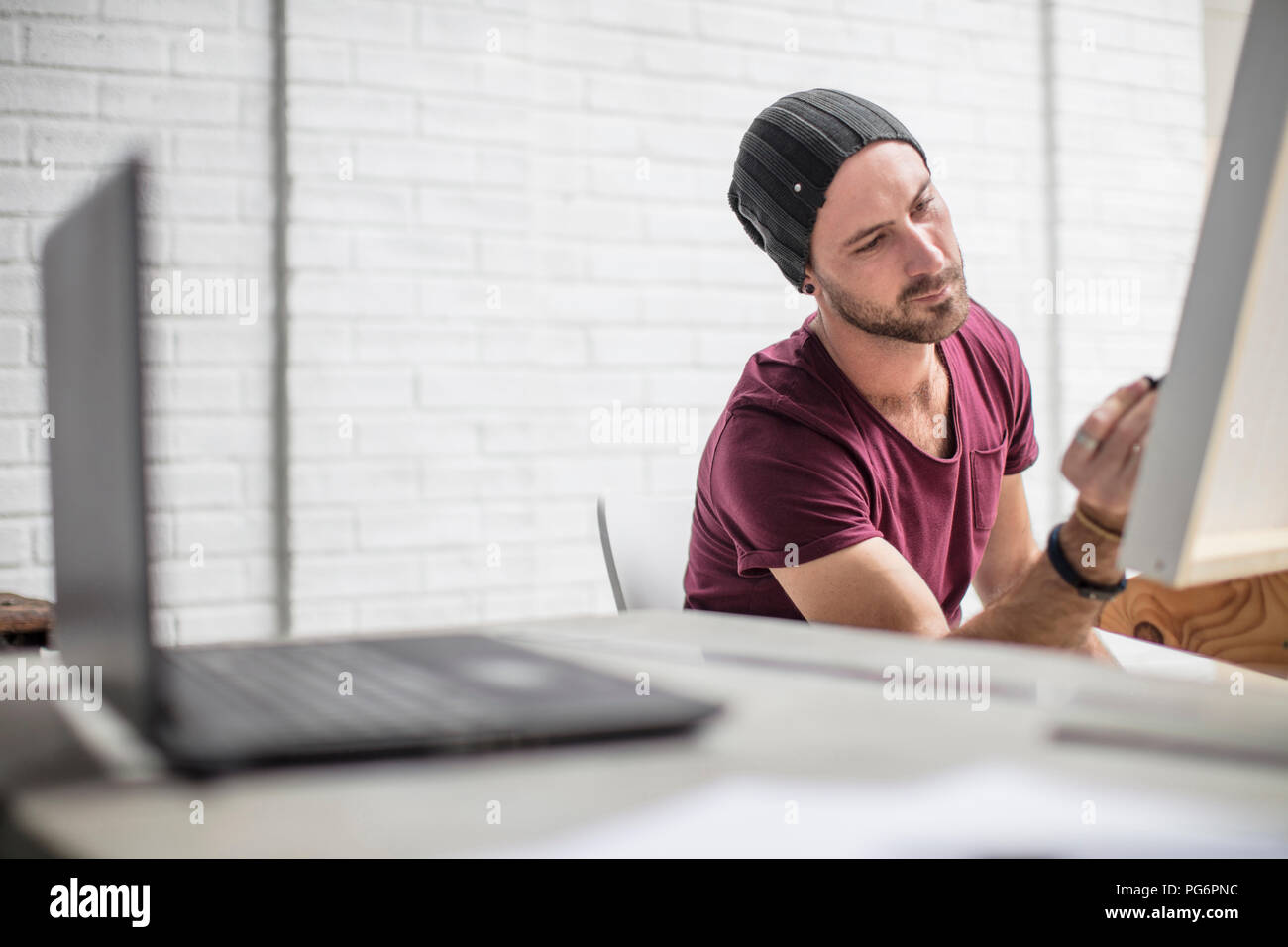 Artist drawing in studio Stock Photo - Alamy