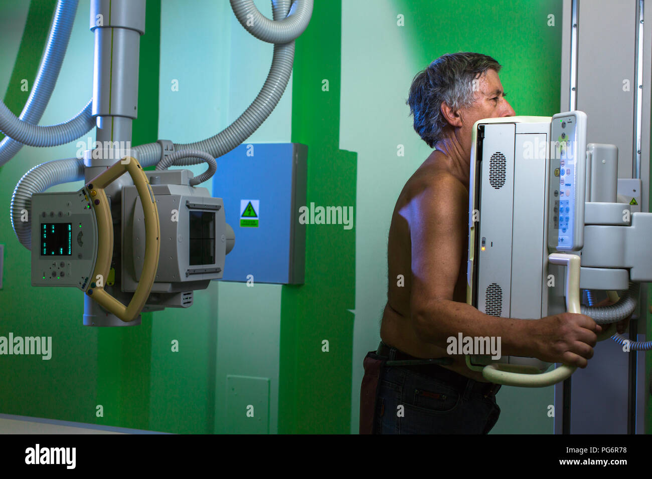 Healthcare Concept - Senior male patient undergoing an X-ray ...