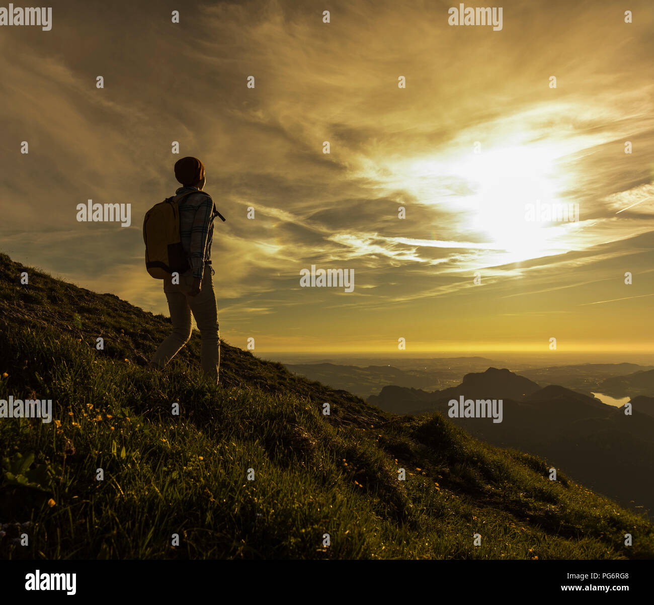 Woman walking alone in mountains hi-res stock photography and images ...