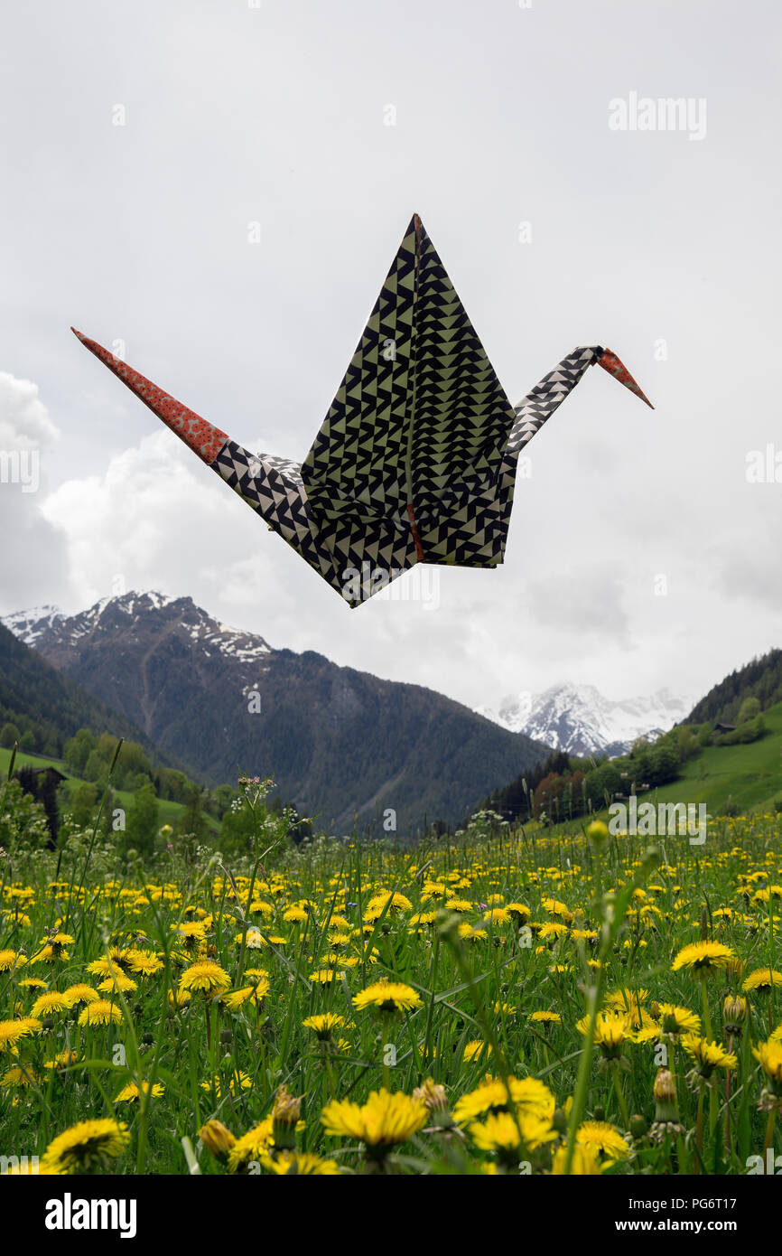 Flying origami hi-res stock photography and images - Alamy