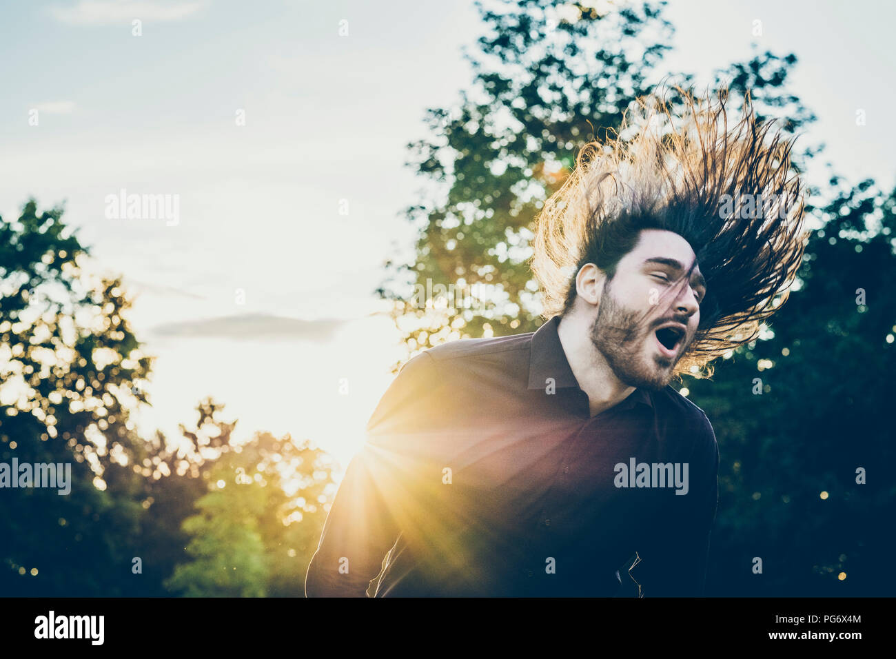 Headbangen in a park hi-res stock photography and images - Alamy