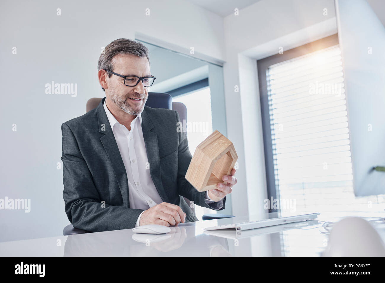 Back Of Man Seated Desk High Resolution Stock Photography and Images ...