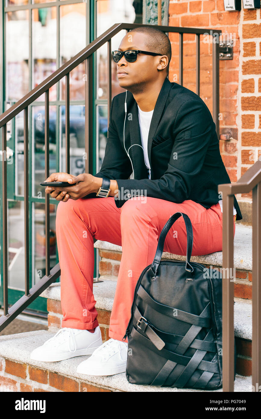 Man waiting on stairs hi-res stock photography and images - Alamy