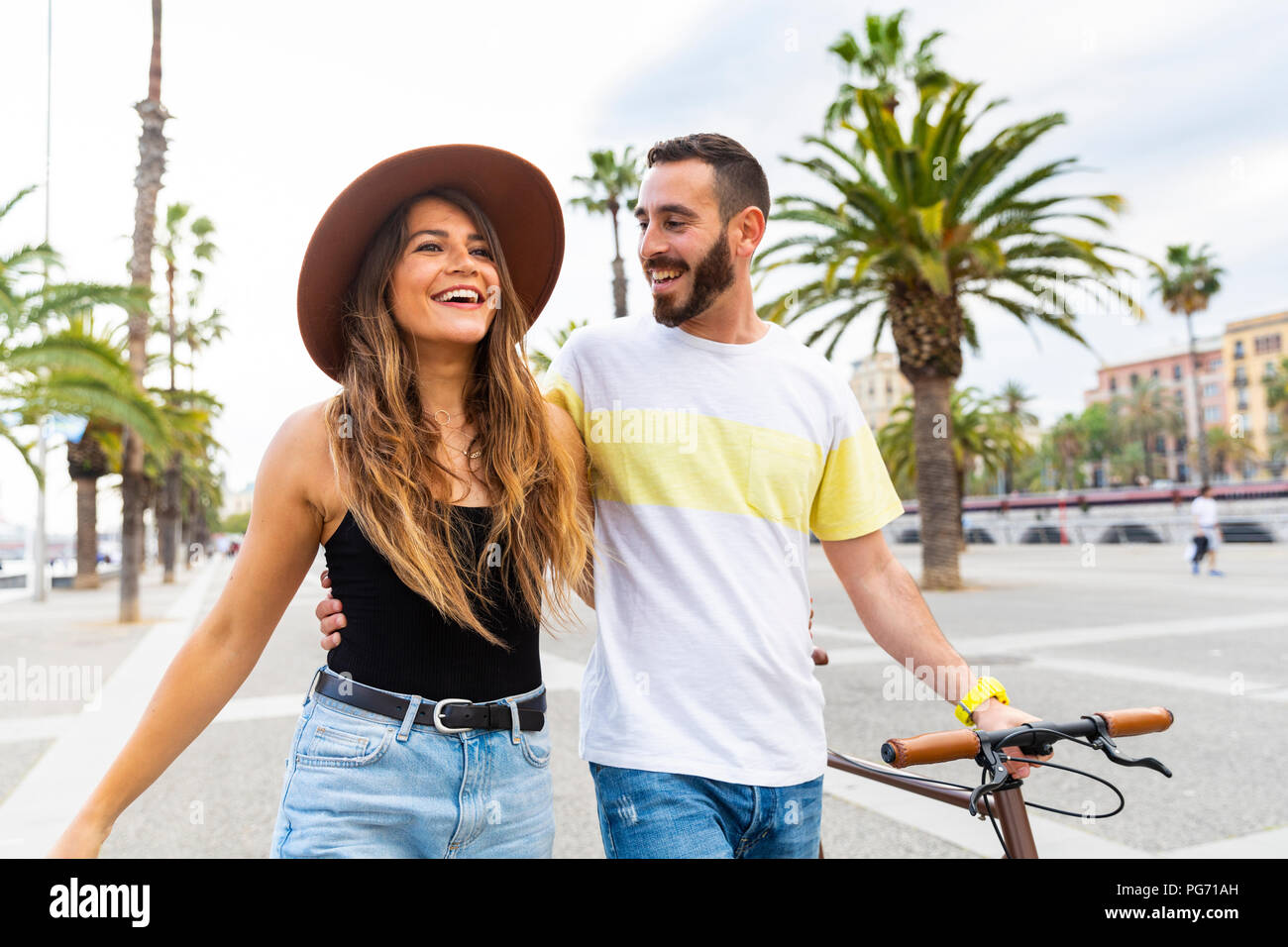 Woman walking promenade trees hi-res stock photography and images - Alamy