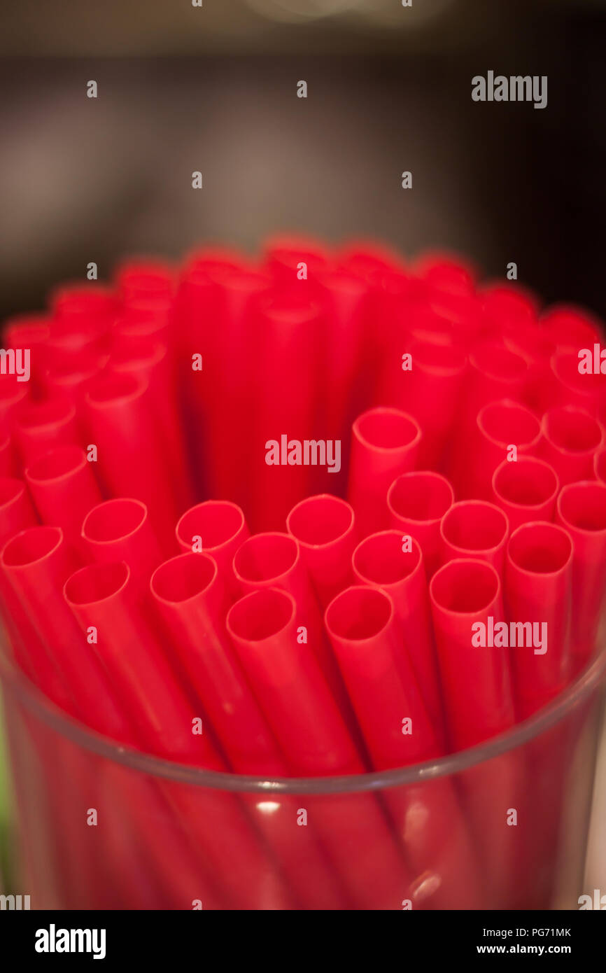 Red straws plastic drinking background, stock photo Stock Photo - Alamy