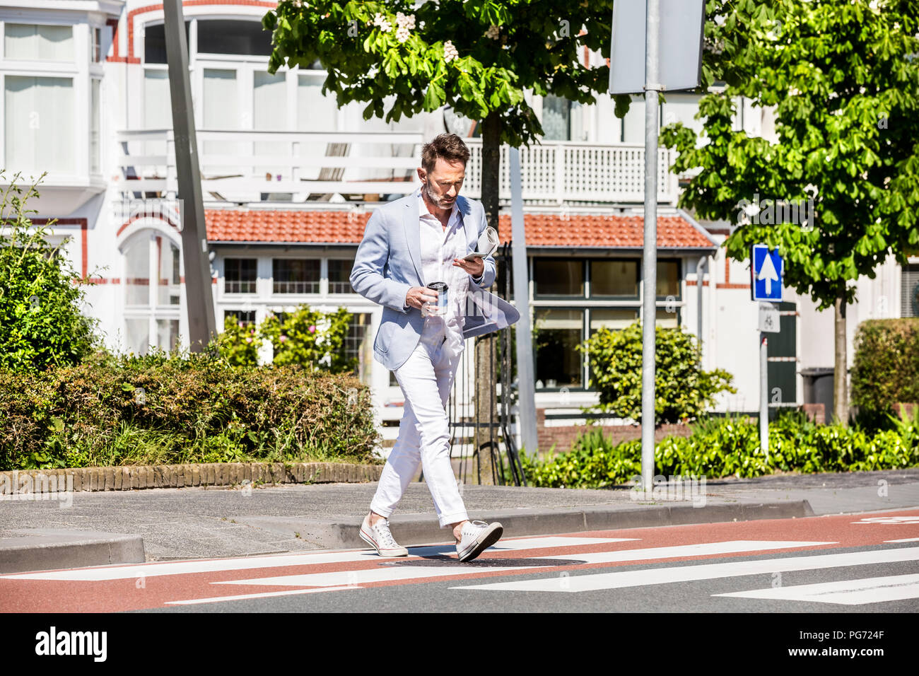 Man crossing light hi-res stock photography and images - Alamy