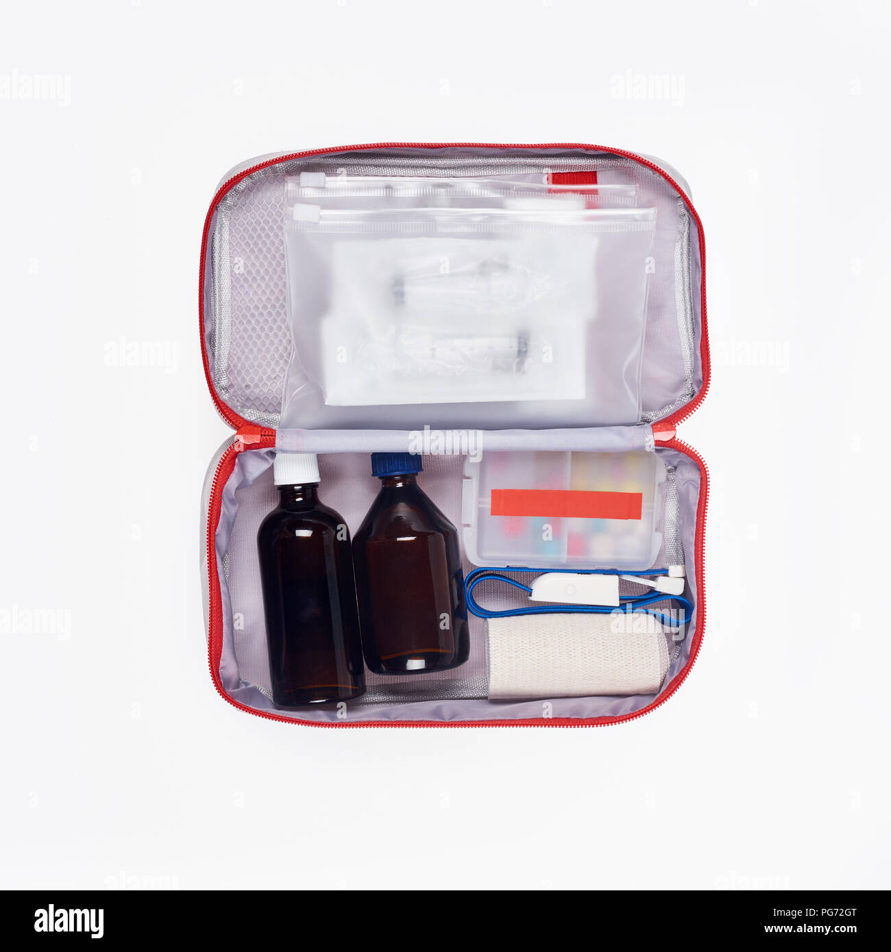 top view of automotive first aid kit with different medicines isolated ...