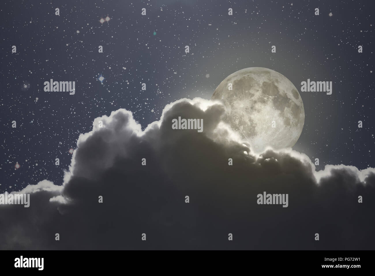 Full moon rises over a cloud on a starry night (used part of a NASA ...